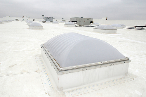 How Do You Keep Cool with a DIY Reflective Roof Coating? | Networx